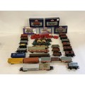 A Collection of Unboxed "00 Gauge" Wagons along with Five Boxed Wagons.