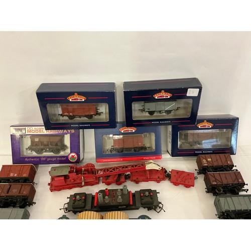 A Collection of Unboxed "00 Gauge" Wagons along with Five Boxed Wagons.