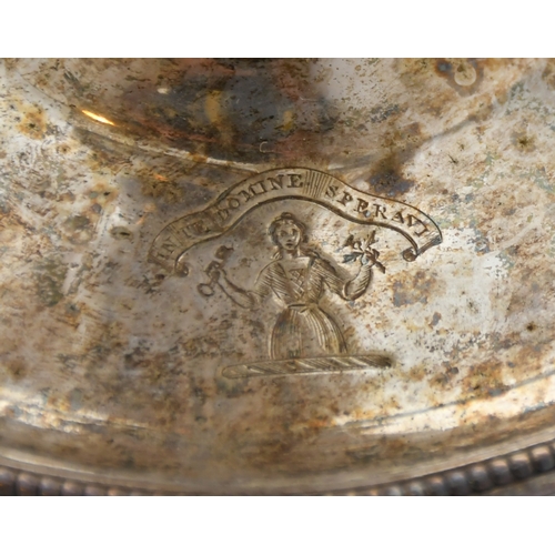 A matched pair of George III silver chambersticks, crest with motto ...