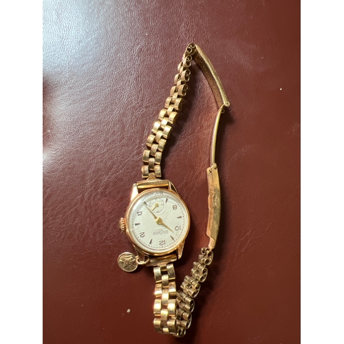 Ladies rolled gold watch with 9 carat gold st Christopher