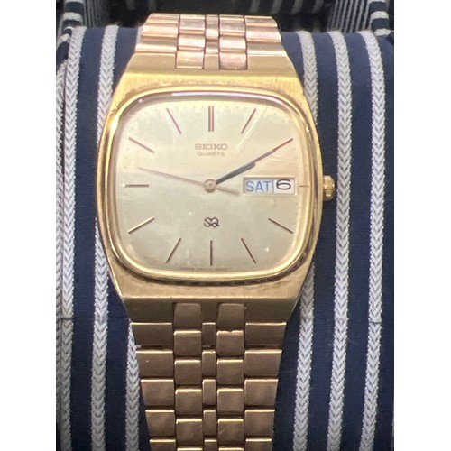 seiko quartz gold tone square face wrist watch