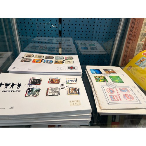 shelf full of 1st day covers