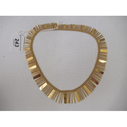 An 18ct gold rod, pendant and tab design necklace, on a bayonet clasp