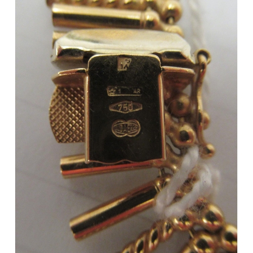 An 18ct gold rod, pendant and tab design necklace, on a bayonet clasp