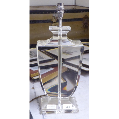 A modern chamfered tinted glass table lamp of pedestal vase design 18"h