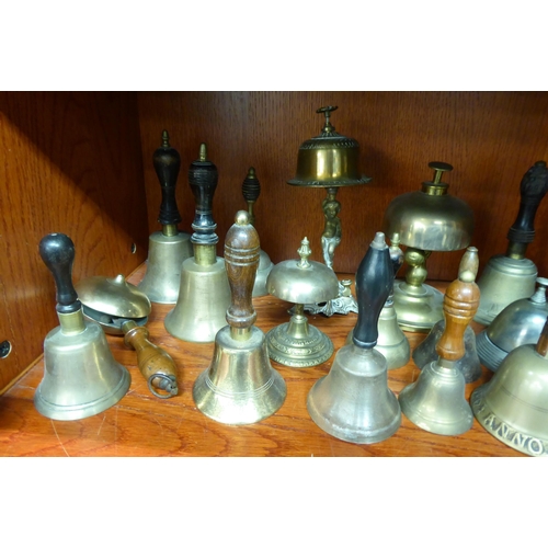 Victorian and later brass hand and counter bells, most on turned ...
