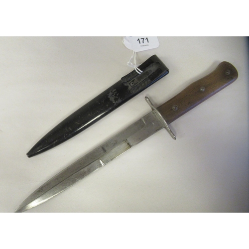 A Third-Reich era German Luftwaffe boot knife, with a studded maple ...