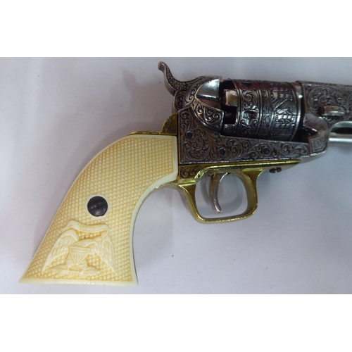 A mixed lot: to include a replica cast metal revolver
