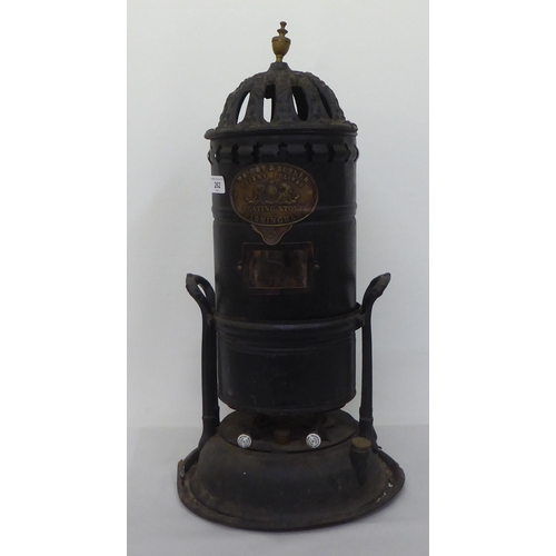 A vintage Wright & Butler of Birmingham cast black painted metal ...