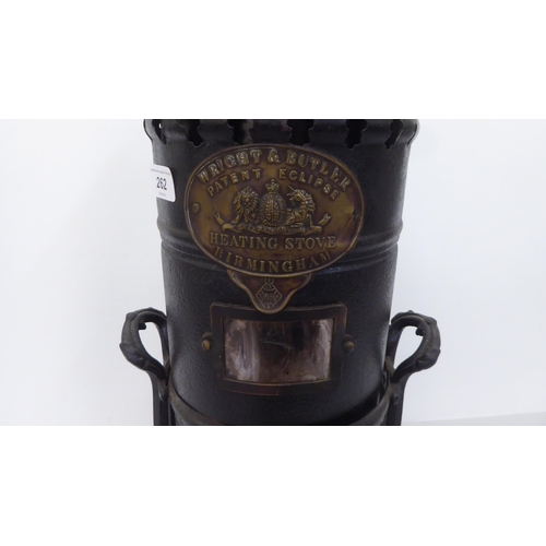 A vintage Wright & Butler of Birmingham cast black painted metal ...