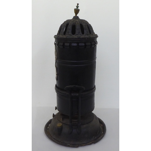 A vintage Wright & Butler of Birmingham cast black painted metal ...