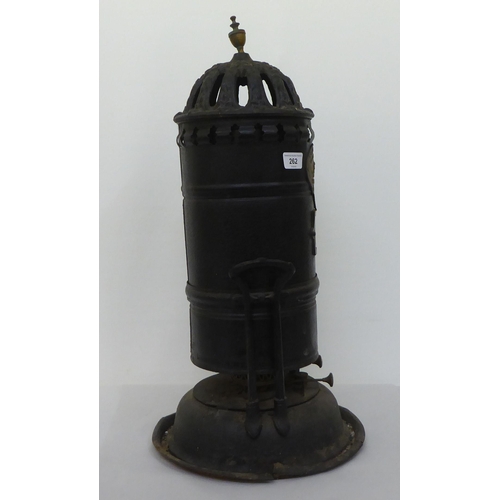 A vintage Wright & Butler of Birmingham cast black painted metal ...