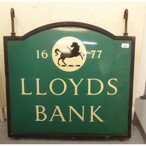 A cast iron and enamelled shop sign 'Lloyds Bank' 29"h 27"w