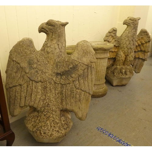 A pair of late 1950s composition stone grotesque birds on separate ...