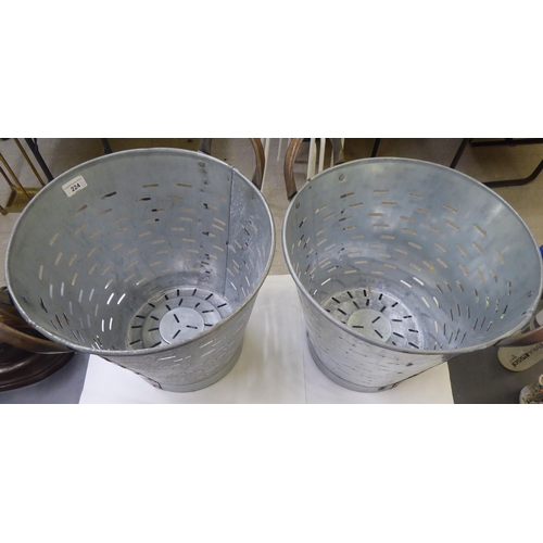 Two galvanised metal tapered and pierced grape collecting buckets with ...