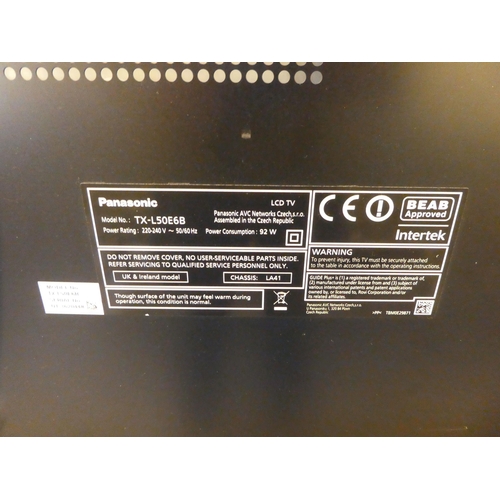 A Panasonic 50" flatscreen television with remote control
