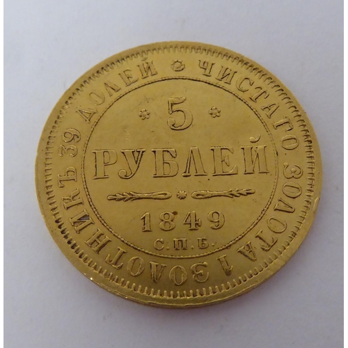 An 1849 Russian five roubles gold coin