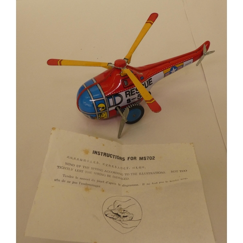 Three Dinky diecast model aeroplanes and a car; and a Chinese made ...