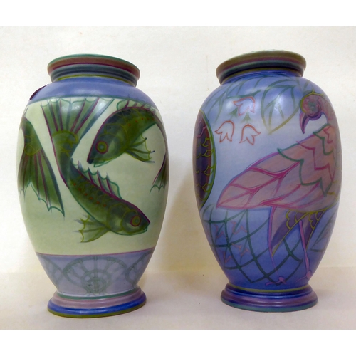 Two Poole pottery vases, one decorated with birds, the other fish 9"h