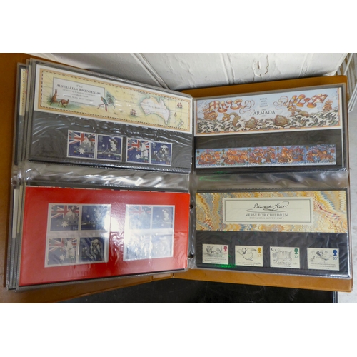 Five albums of variously themed postage stamps presentation packs