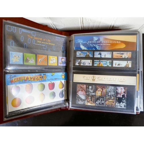 Five albums of variously themed postage stamps presentation packs