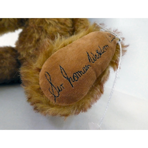 A Merrythought 'Norman Wisdom' Teddy bear with mobile limbs 16"h