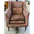 A late Victorian library chair with a heals inspired paisley pattern ...