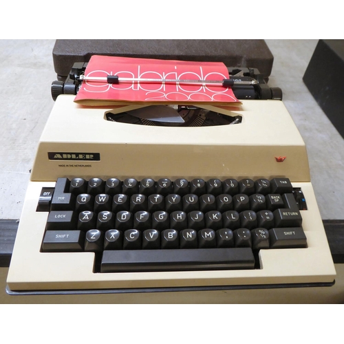 Five cased typewriters: to include an Olympia De Luxe example; and an ...