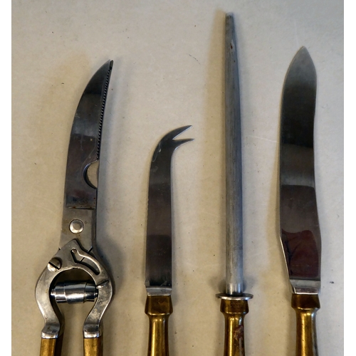 A Georg Jenson Design, four piece bi-coloured metal carving set