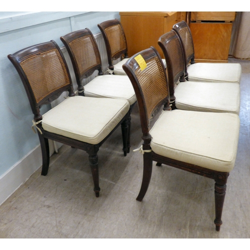A set of six Regency faux rosewood framed dining chairs, each with a ...