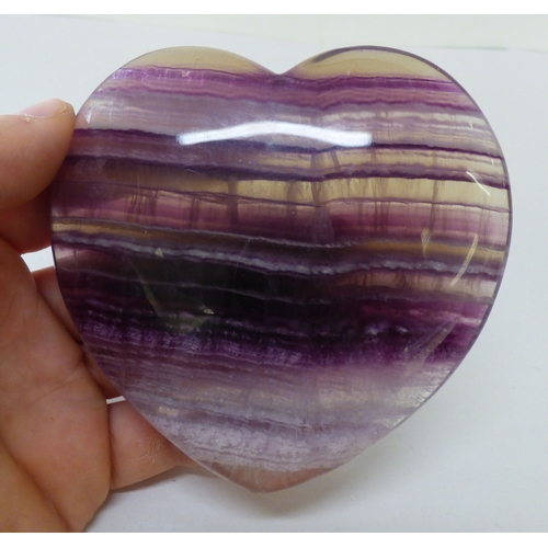 A carved and polished Blue John heart 4"h 4"w