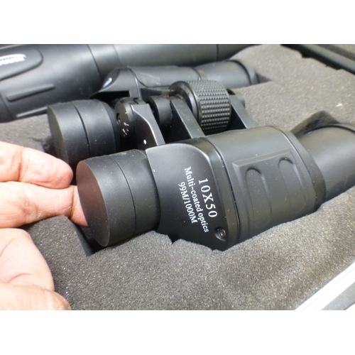A pair of Zennox 10x50 binoculars; and a 20-60x60 zoom lens cased