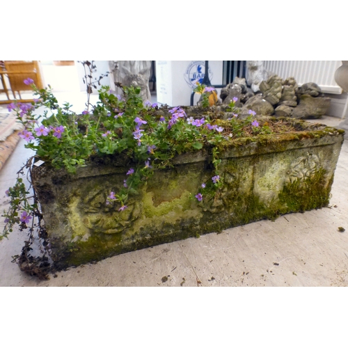 Three composition stone, trough design planters largest 8"h 46"w; and a ...