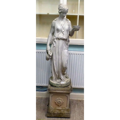 A composition stone figure, a classically robed woman 39"h on a plinth ...
