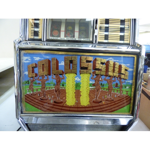A vintage Jubilee Riviera Colossus one arm bandit fruit machine 29.5"h 15"w