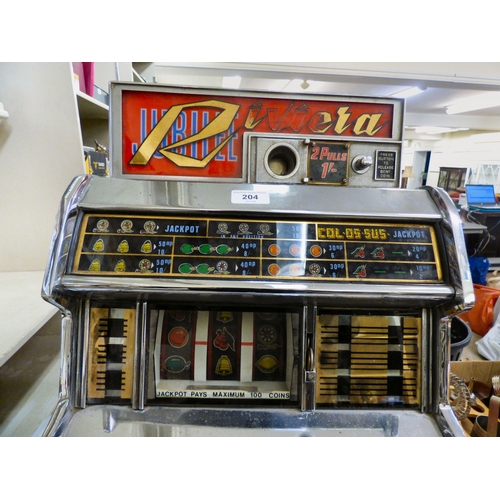 A vintage Jubilee Riviera Colossus one arm bandit fruit machine 29.5"h 15"w