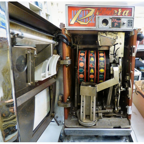 A vintage Jubilee Riviera Colossus one arm bandit fruit machine 29.5"h 15"w