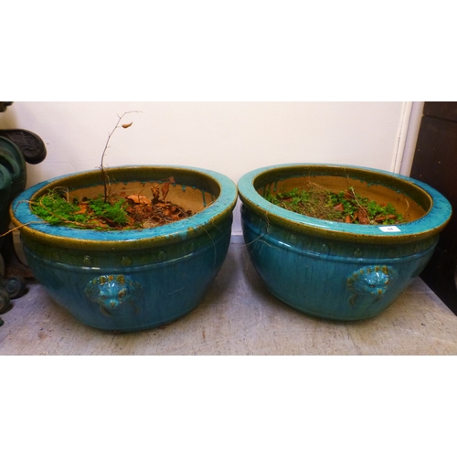 A pair of streaky blue glazed pottery terrace planters 11"h 22"dia