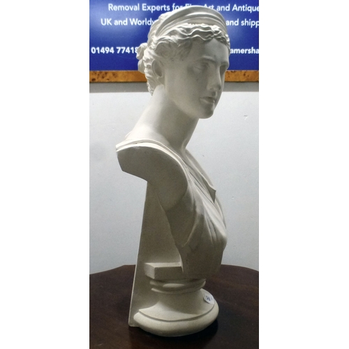 A composition plaster bust, Artemis, on a pedestal plinth 20.5"h