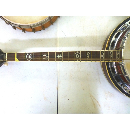 A circa 1920s Clarophone four string banjo; and another, circa 1970s ...