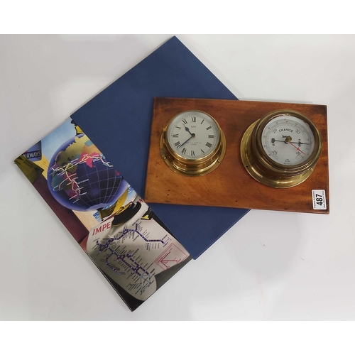 A Sestrel barometer and clock in the naurical style mounted on mahogany ...