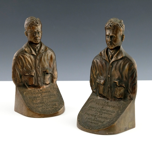 A pair of Charles Lindbergh cast bookends, commemorating his non-stop ...