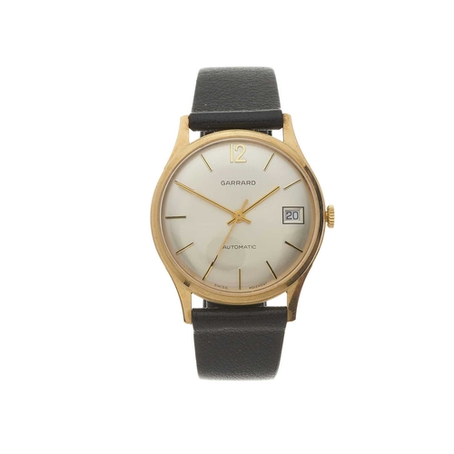 Garrard, a 9ct gold date wrist watch, circa 1985, case numbered 560257 ...