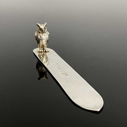 An Elizabeth II silver bookmark, the terminal fitted with an applied ...