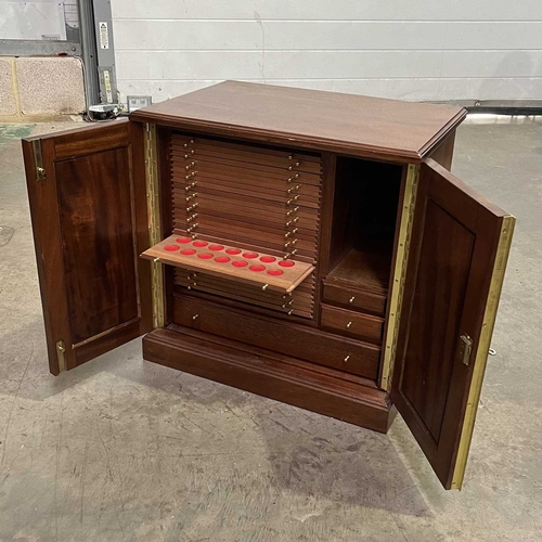A coin collectors cabinet by Peter Nichols, fitted 30 trays with felt ...