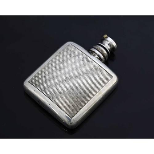 A twentieth century silver-coloured metal atomiser, of rounded ...