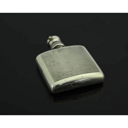 A twentieth century silver-coloured metal atomiser, of rounded ...