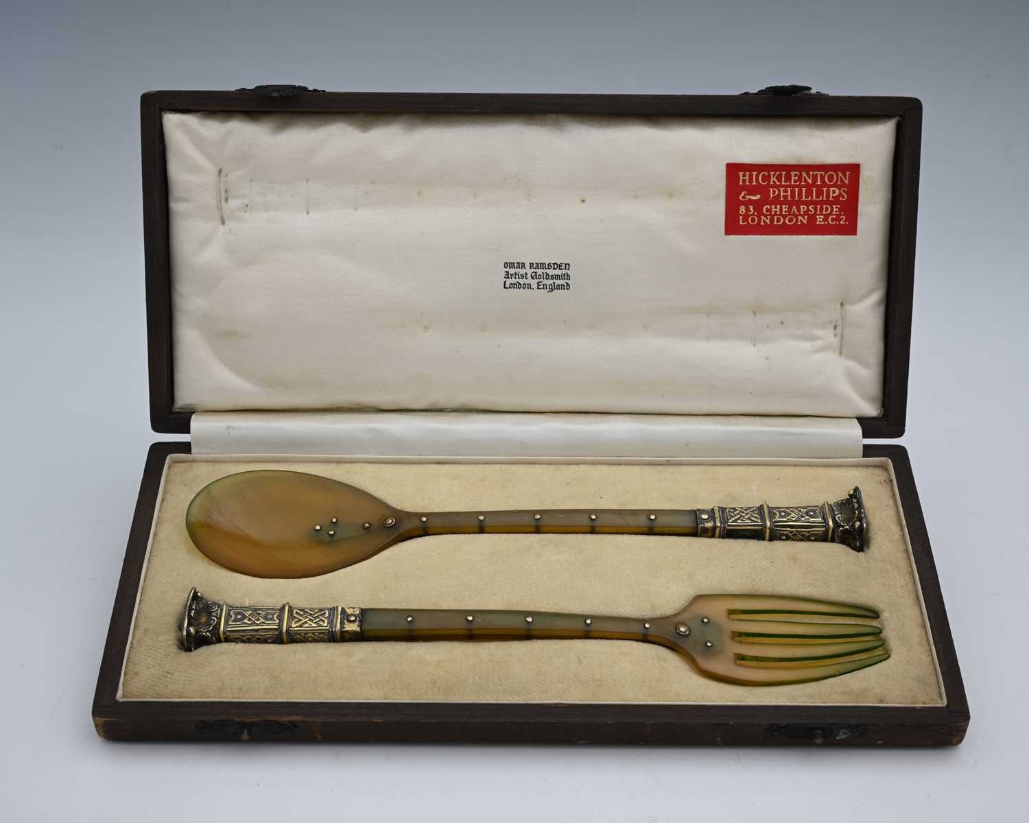 Omar Ramsden. A George V Arts & Crafts silver-gilt-mounted cased ...