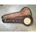 A rosewood banjo, brass wire inlaid decoration