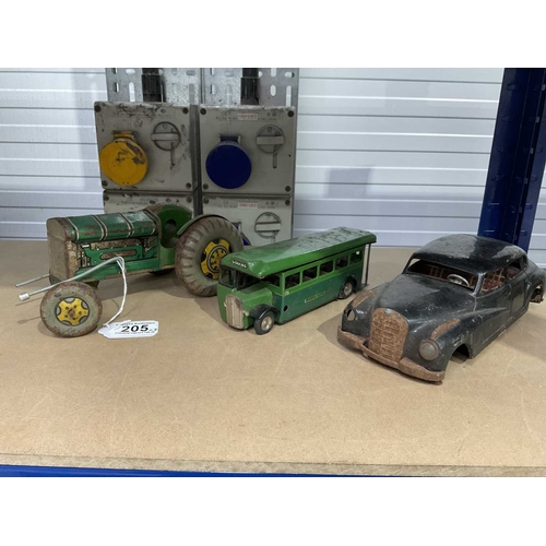Three tinplate car model toys, a Triang Minic 'Green Line' bus ...